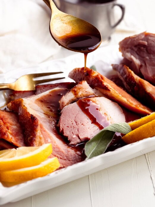 Moist Oven-Baked Ham with Spiced Rum + Brown Sugar Glaze - A Sassy Spoon®