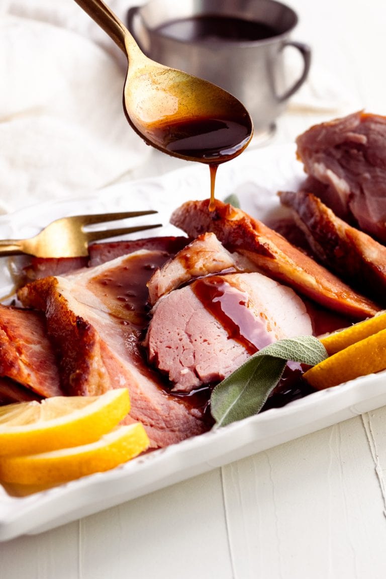 Moist Oven-Baked Ham with Spiced Rum + Brown Sugar Glaze - A Sassy Spoon®